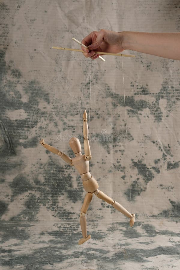 Puppet in the Hands of Puppeteer Walks on , Background. the Concept of ...
