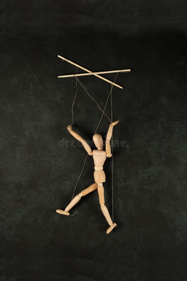Puppet in the Hands of Puppeteer Walks on , Background. the Concept of ...
