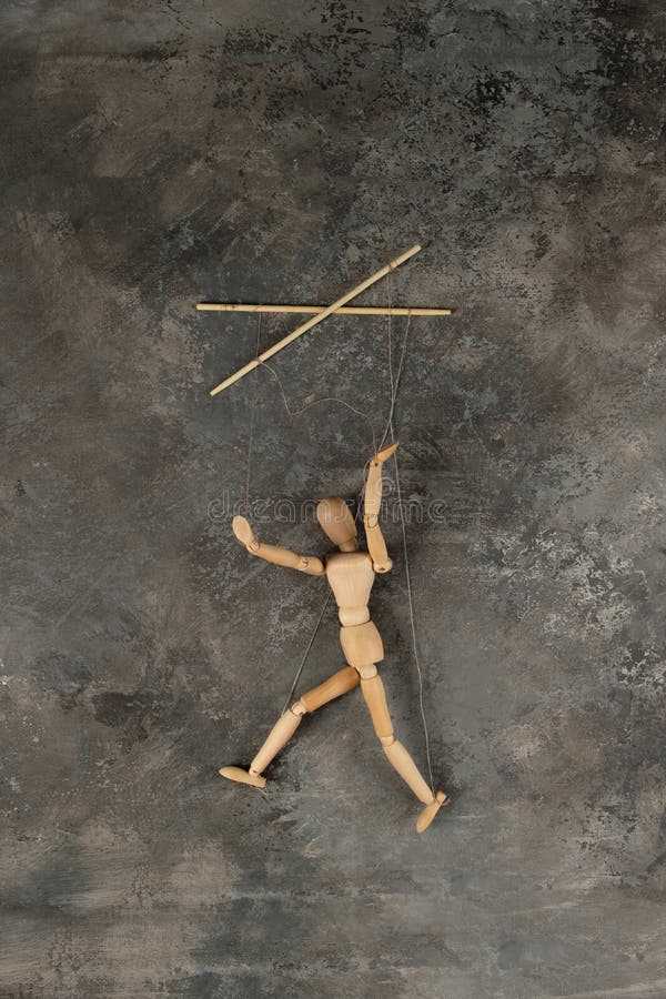 Puppet in the Hands of Puppeteer Walks on , Background. the Concept of ...
