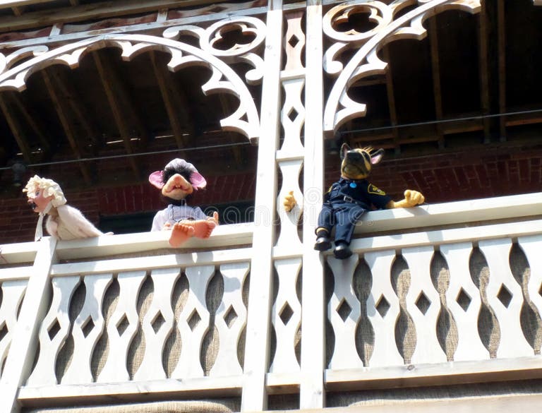 Puppet Trio Looking from a Balcony Stock Image - Image of trio, message ...