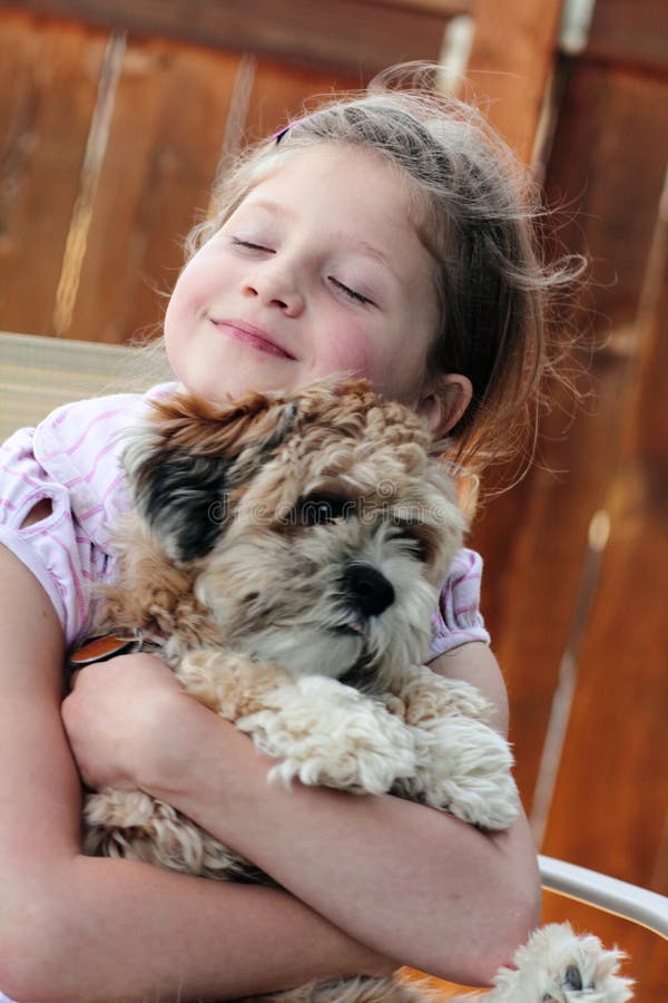 Puppy Love stock image. Image of child, breed, bliss - 20615781
