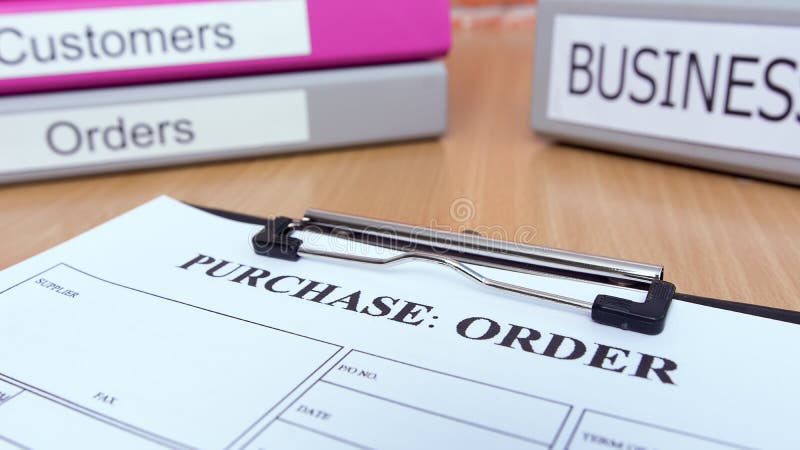 Purchase Order Form on Wooden Table with Business Files Stock Photo ...