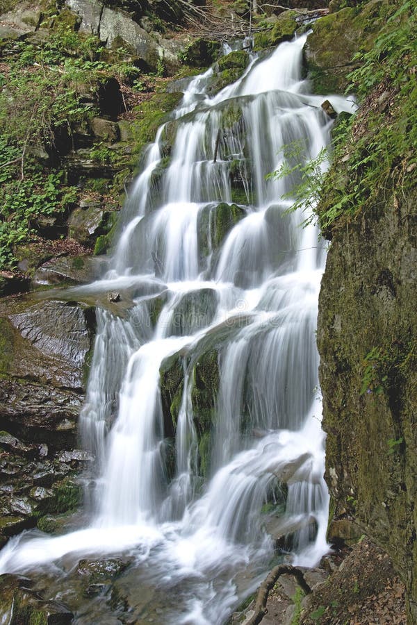 Pure and Cold Mountain River is Running between Rocky Stones and Flows ...