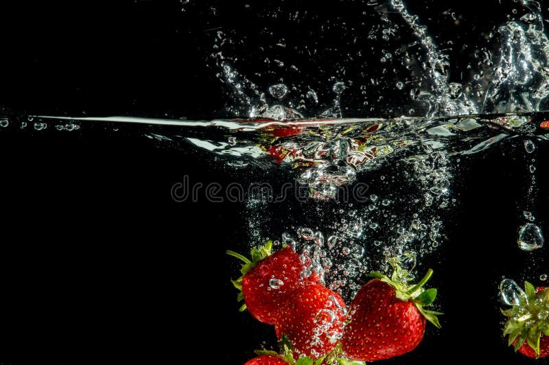 Pure Falling Strawberry into Water Stock Photo - Image of macro, liquid ...