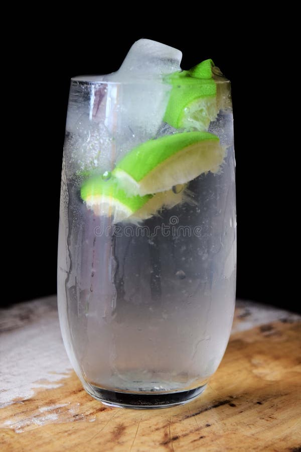 Pure Lemonade in a Glass. Summer Drinks Serving with Lemon and Ice ...