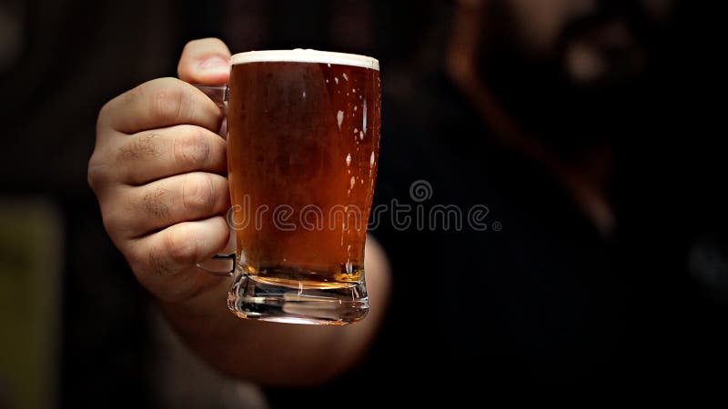 Pure Malt Golden Draft Beer Stock Photo - Image of handn, closeup ...