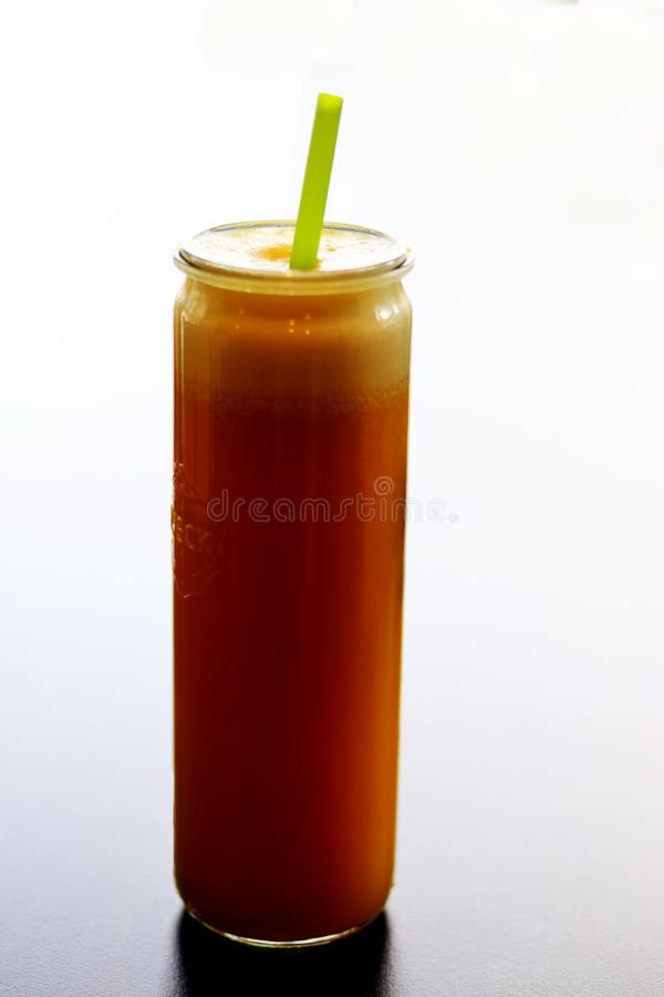 Pure Orange Juice in a Glass with a Straw Stock Image - Image of ...