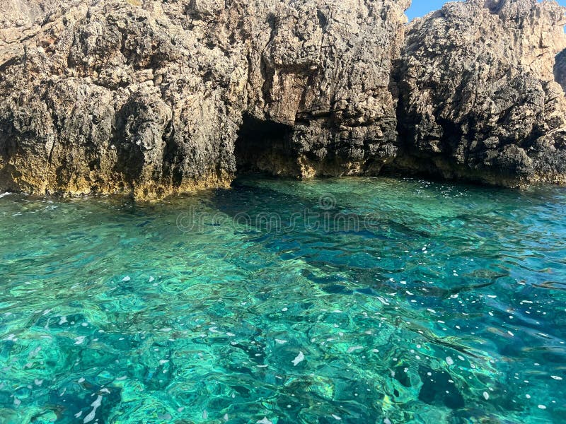 Pure Teal Water and the Cliffs of Zakynthos Island, Greece Stock Photo ...