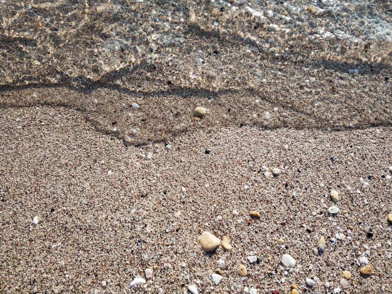 Pure Transparent Ocean Wave on a Sandy Beach. Background Stock Image ...