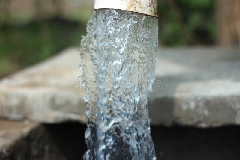 Water flows from the pipe stock image. Image of clear - 267719873