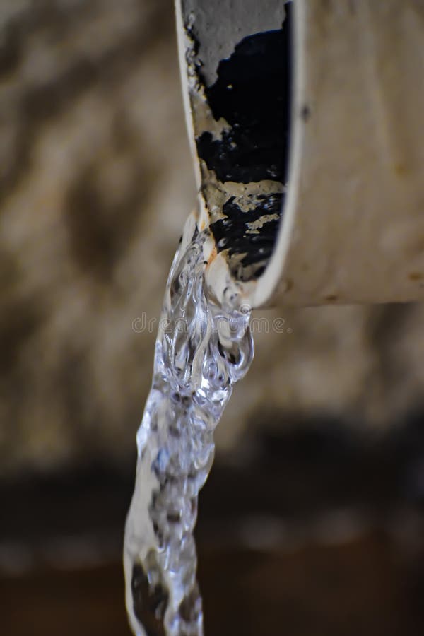 Pure water stock photo. Image of rain, water, pure, pipe - 138428500
