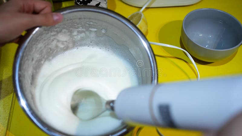 Whipping a White Cream with a Hand Mixer Stock Video - Video of pour ...