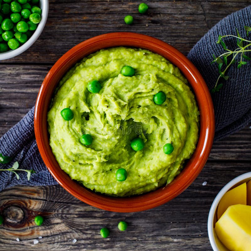 Puree - Mashed Potatoes with Green Pea in Bowl on Wooden Table, Top ...
