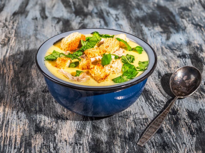 Puree Soup with Chicken Meat and Toasted Croutons in a Blue Plate Stock ...