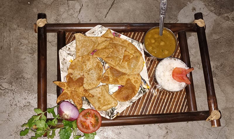 Puri Shapes with Cholaa and Rice Stock Photo - Image of rice, cholaan ...