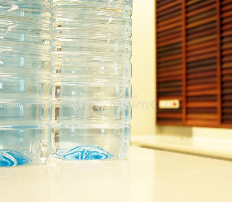 Purified Water Bottle on White Table Stock Image - Image of clear ...