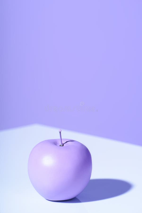 Purple Apple on Violet Background with Copy Space Stock Photo - Image ...