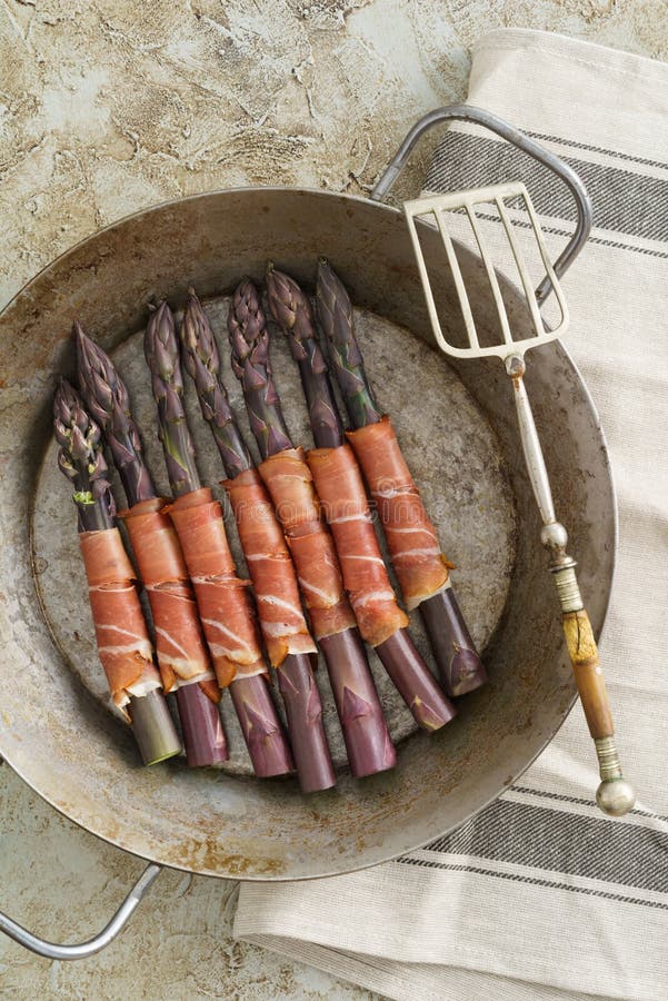 Purple Asparagus with Gammon Stock Photo - Image of rustic, vegetarian ...