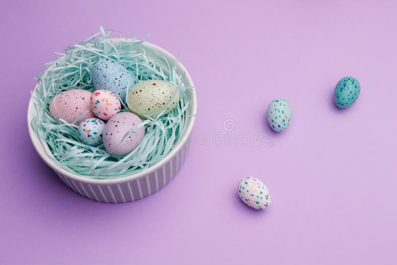 Easter Eggs in a Plate on a Purple Background Stock Image - Image of ...