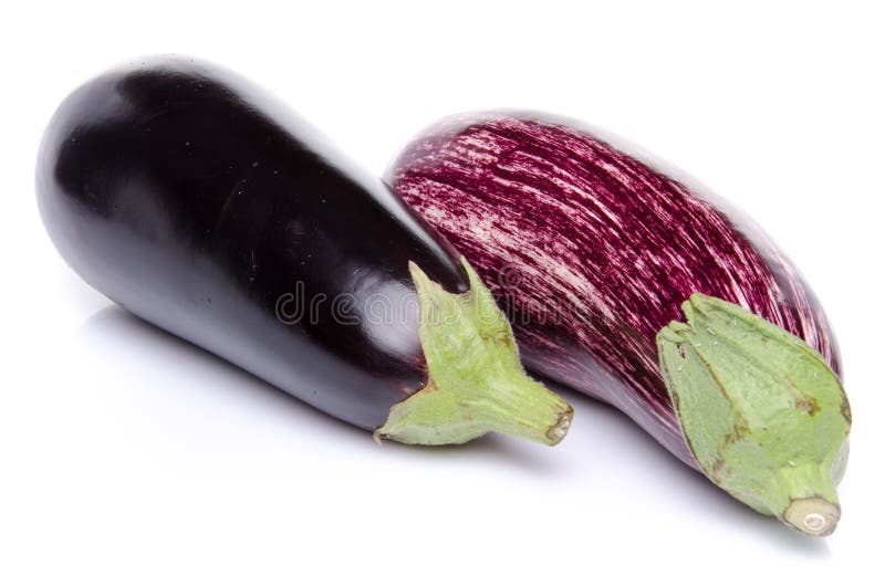Purple and Black Eggplant and Two Zucchini Stock Photo - Image of ...