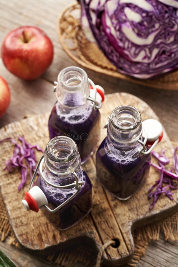 Purple Cabbage Juice in Three Glass Bottles Stock Photo - Image of ...