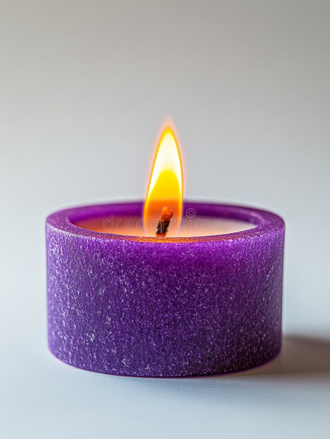 Purple Candle Burning with a Bright Flame, Symbolizing Serenity. Stock ...