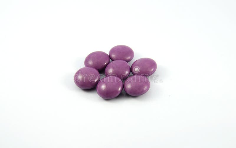 Purple Candy Covered Chocolates Stock Photo - Image of purple, flavored ...