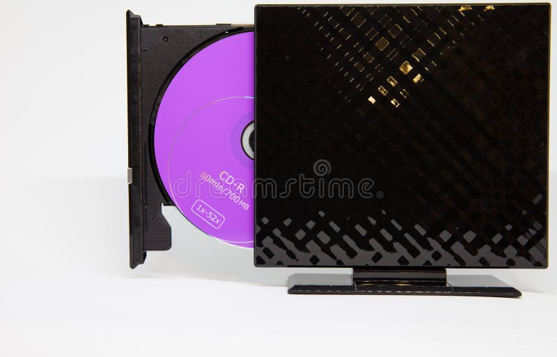 Purple Cd Disk in Black Drive. Stock Image - Image of blanks, files ...