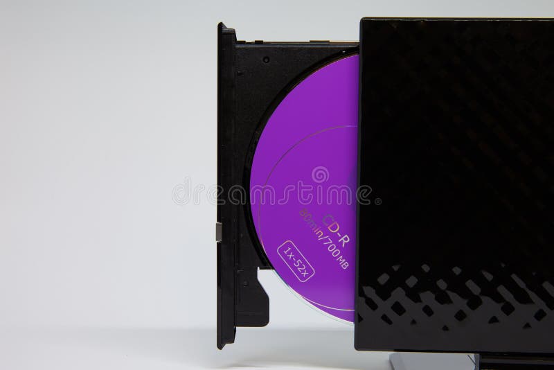 Purple Cd Disk in Black Drive. Stock Photo - Image of filled, blanks ...