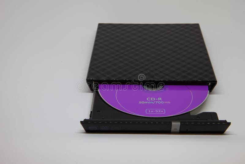 Purple Cd Disk in Black Drive. Stock Photo - Image of black, recording ...