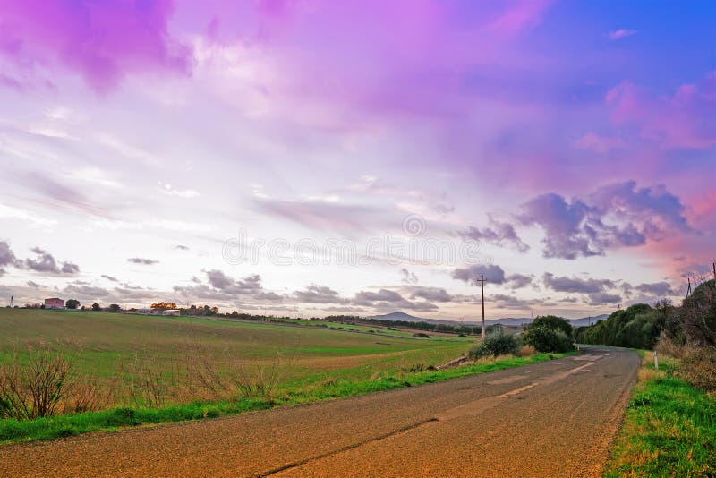Purple clouds stock image. Image of horizon, grass, evening - 38033963