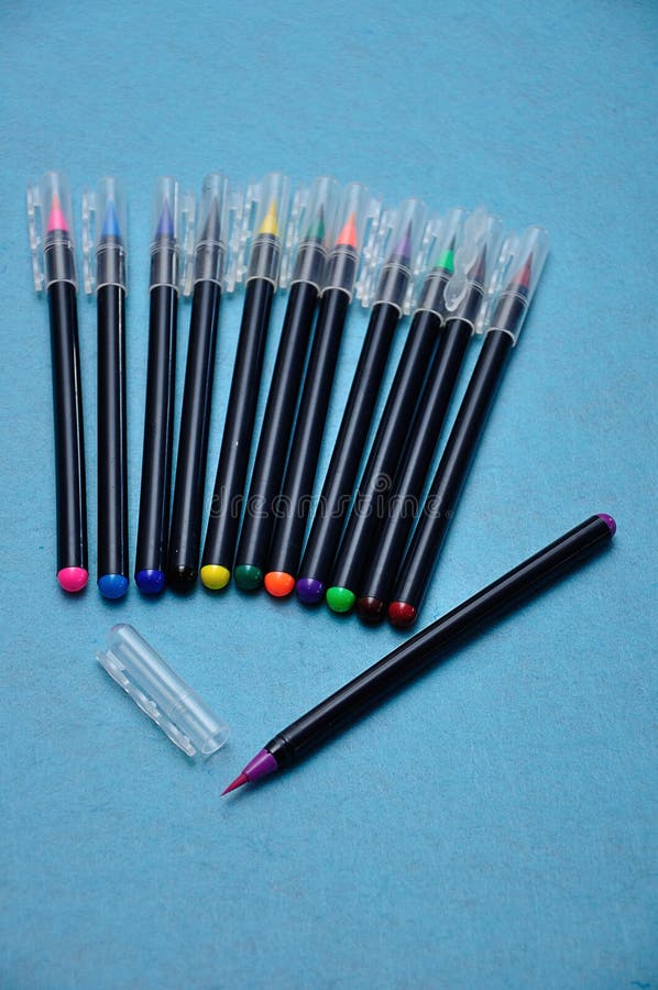 A Purple Color Pen with the Rest Out of Focus Stock Photo - Image of ...