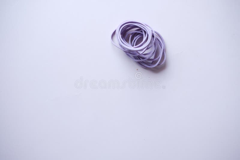 Purple Color Rubber Bands on Table Stock Photo - Image of purple, space ...