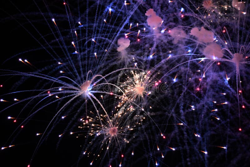 Purple fireworks in sky stock photo. Image of firecracker - 146118002