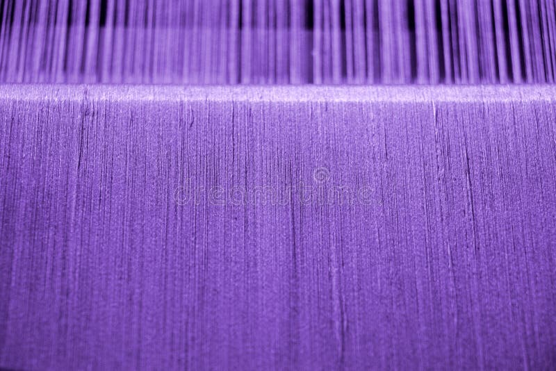 Purple cotton yarn on loom stock photo. Image of decoration - 126514758