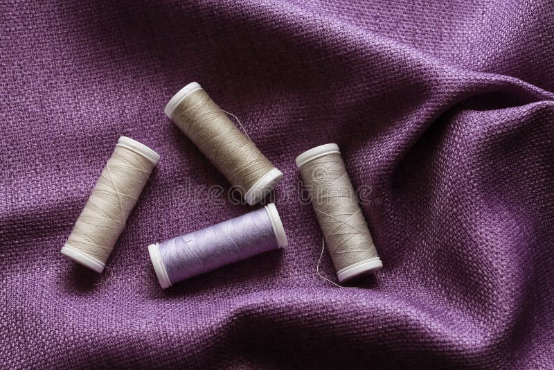 Purple fabric and threads stock image. Image of repairing - 160807661