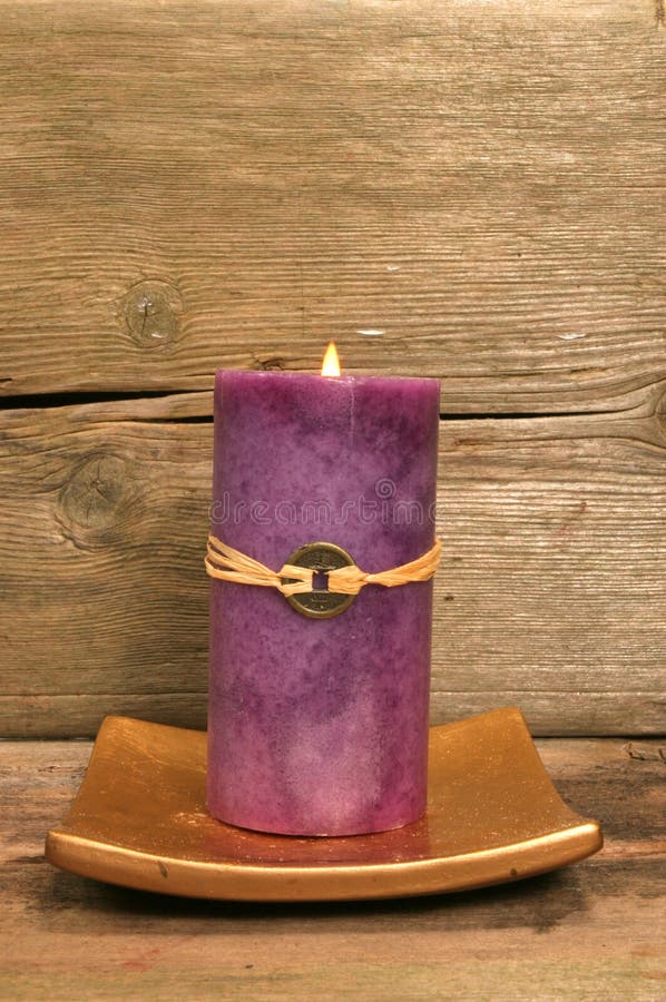 Purple Feng Shui candle stock photo. Image of purple, wood - 4852222