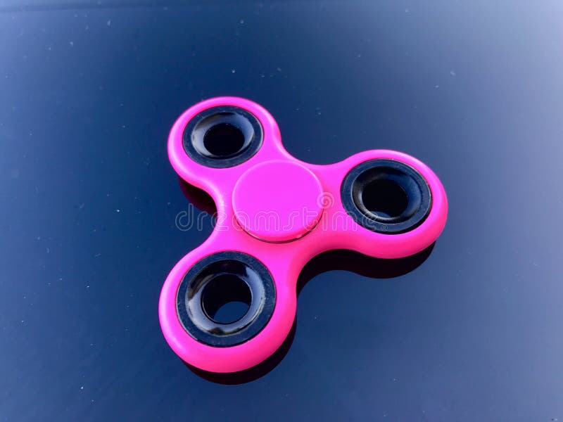 Purple Fidget Spinner Stress Relieving Toy Stock Photo - Image of green ...
