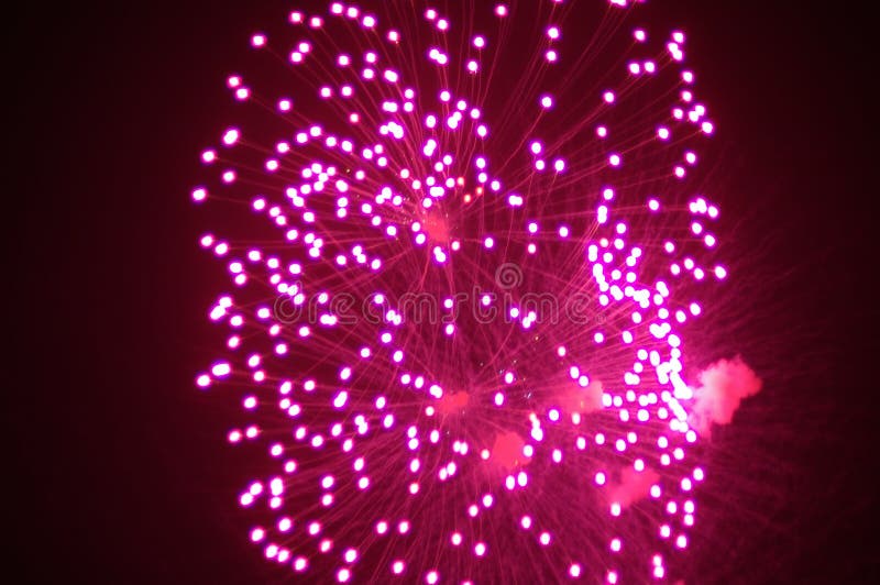 Purple fireworks in sky stock photo. Image of firecracker - 146118002