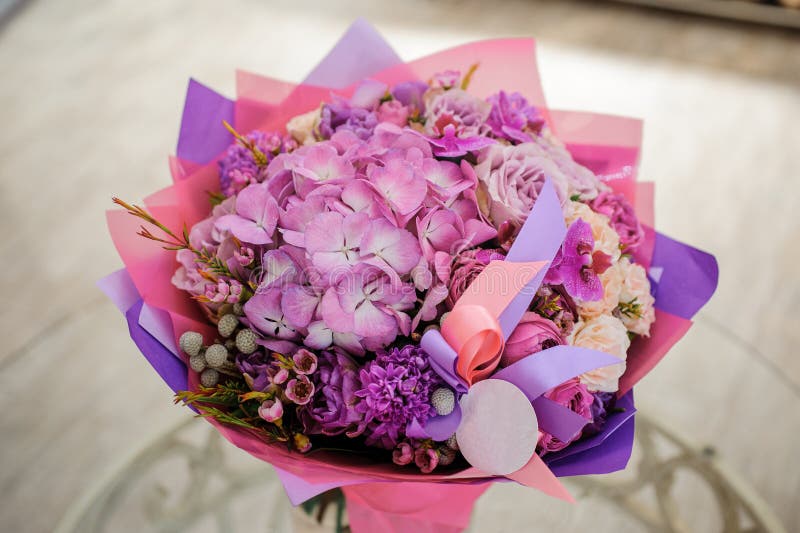 Purple Flower Bouquet Composition on Table Stock Photo - Image of ...