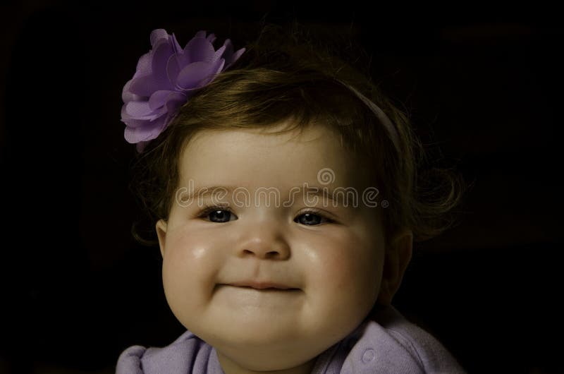 Purple flower girl smiling stock image. Image of purple - 24490199