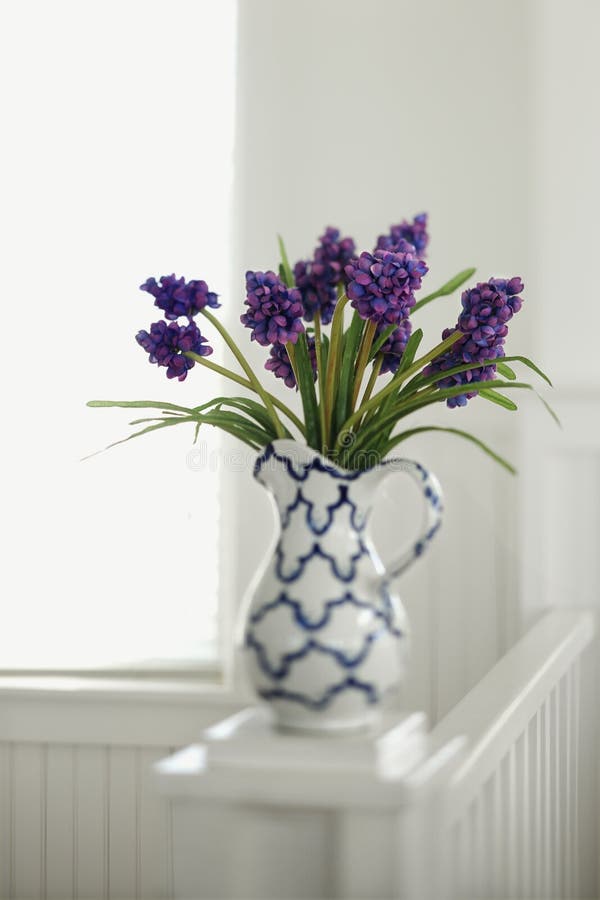 Purple Flowers In Pitcher Stock Photography - Image: 2051602