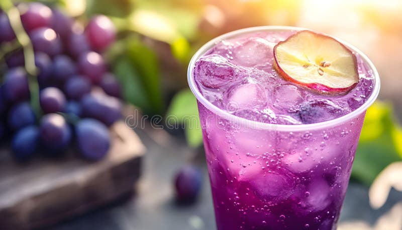 A Purple Grape Soda Mocktail with Visible Bubbles and Grape Slices ...