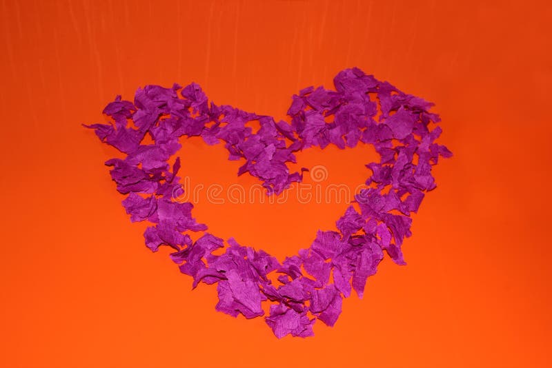 Purple Heart on an Orange Background. a Heart Made of Pieces of Paper ...