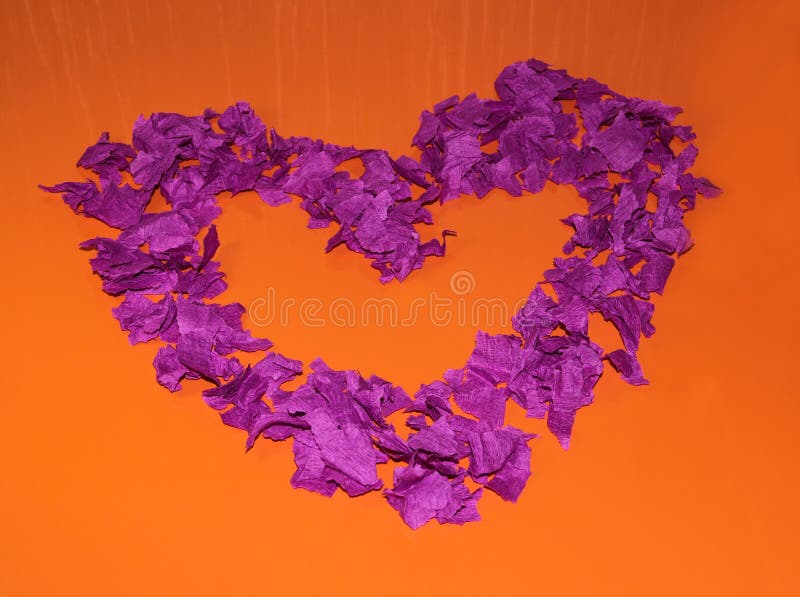 Purple Heart on an Orange Background. a Heart Made of Pieces of Paper ...