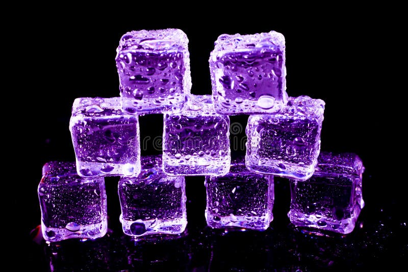 Purple Ice Cubes on a Black Table Stock Photo - Image of reflection ...