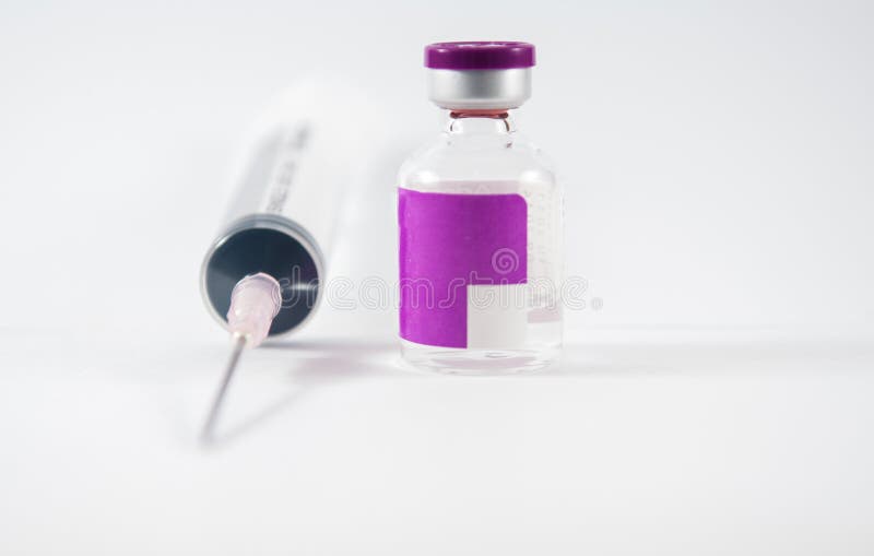 Purple Disposable Syringe On Injection Vials Stock Image - Image of ...