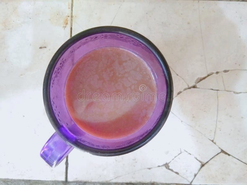 Purple Milk Coffee Glass on Cracked White Table at Home Stock Photo ...