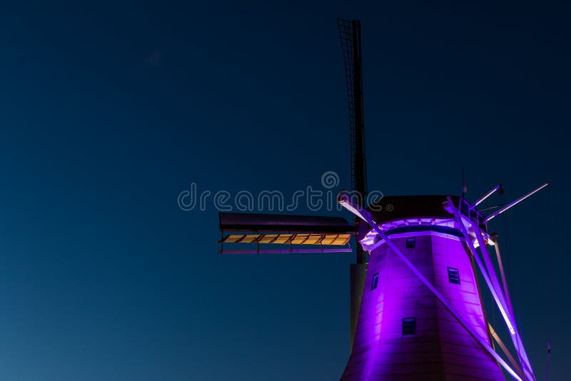 Purple sky with windmill. stock image. Image of abstract - 4375749