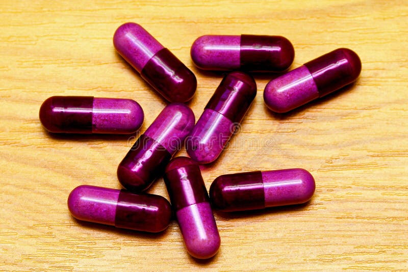 Purple pills stock photo. Image of health, oral, tabs - 14939704